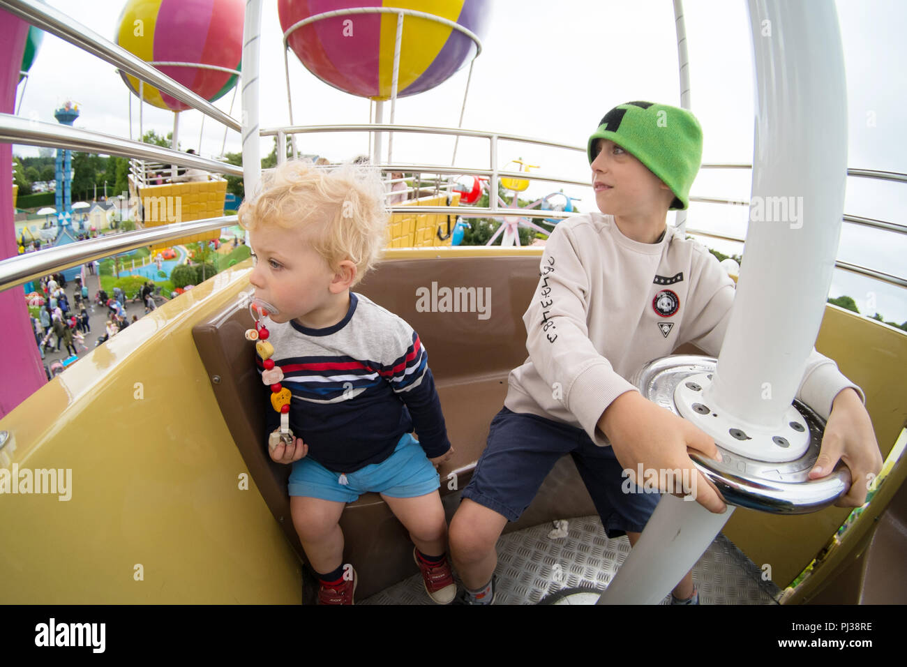 Two boys aged 2 and 9 years old on Peppa Pig's big balloon ride, Peppa ...