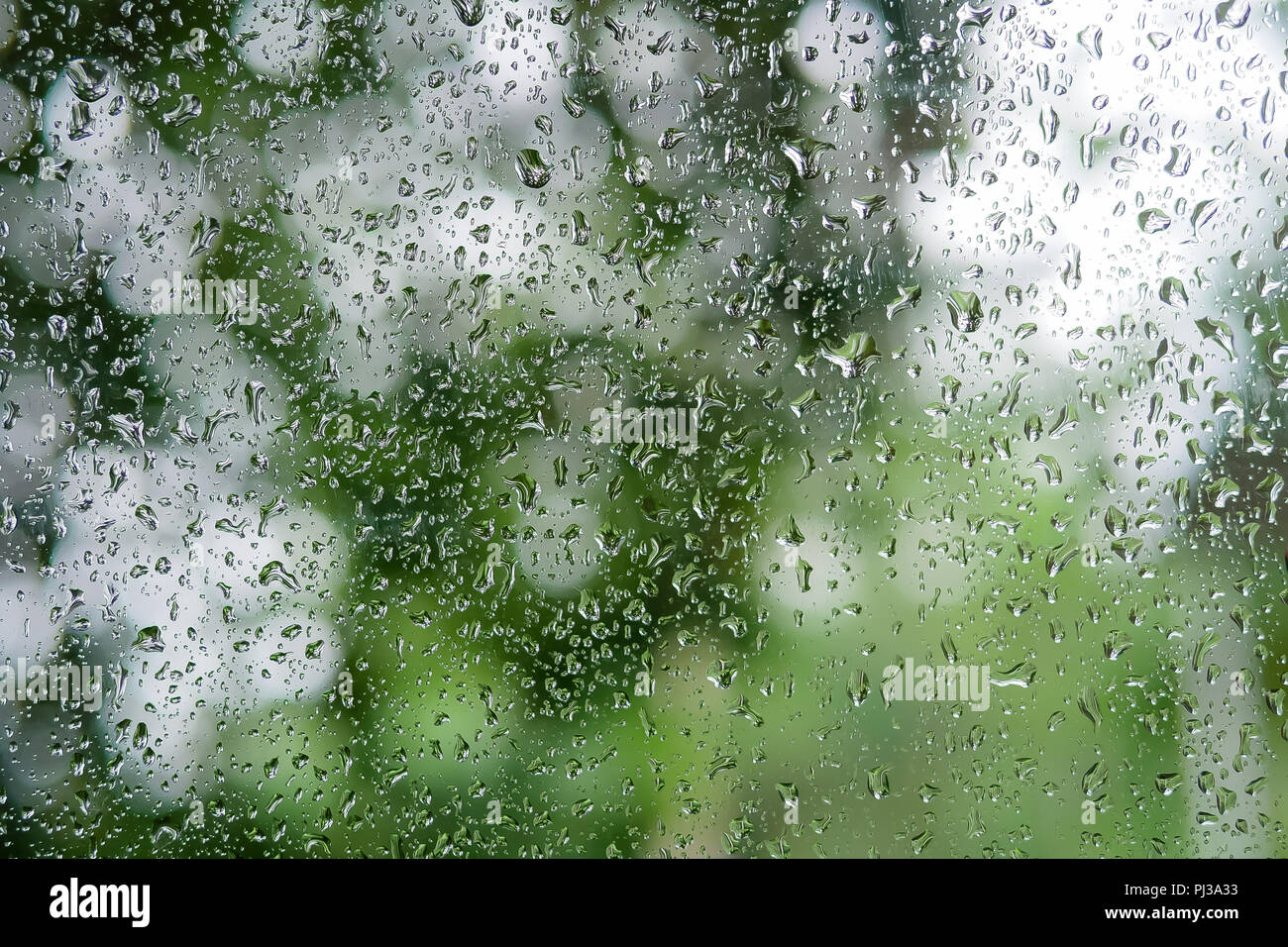 Wet glass window rainy season close up hi-res stock photography and ...