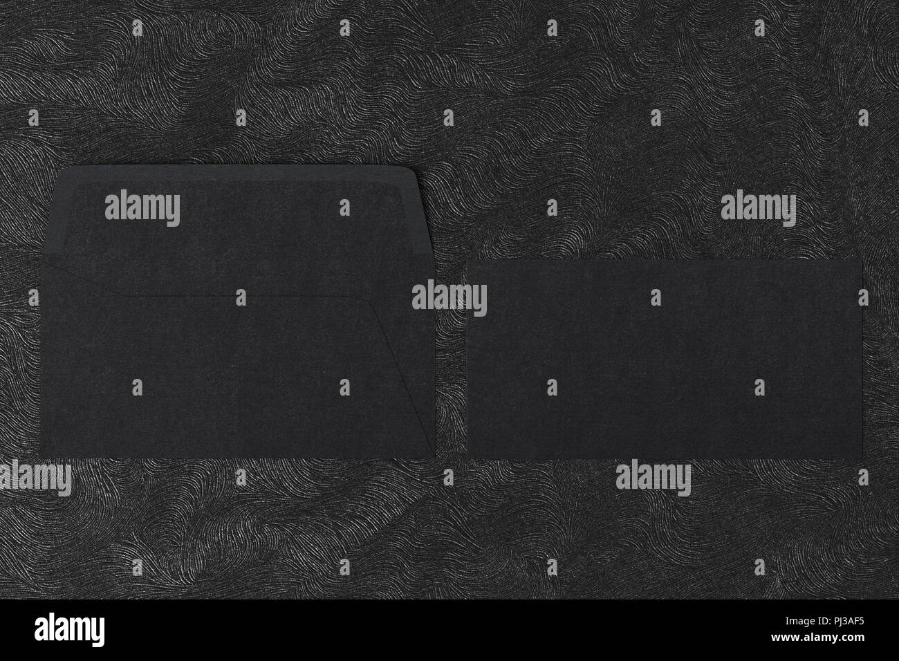 Black blank closed envelope and open envelope on black background. 3d ...