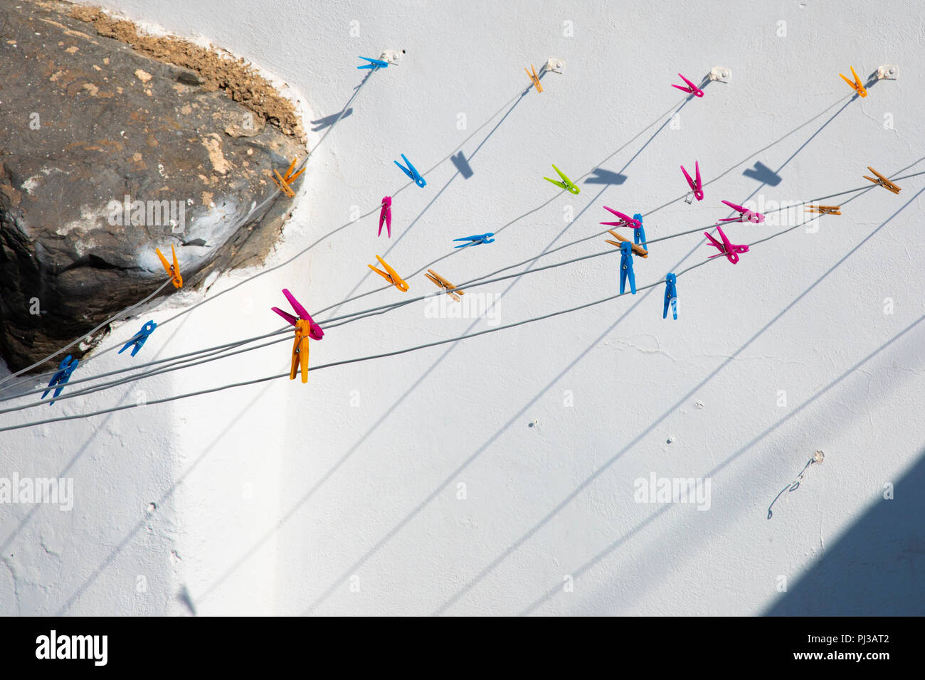 Laundry clothespins in Fira, Thira Santorini Greece Stock Photo - Alamy