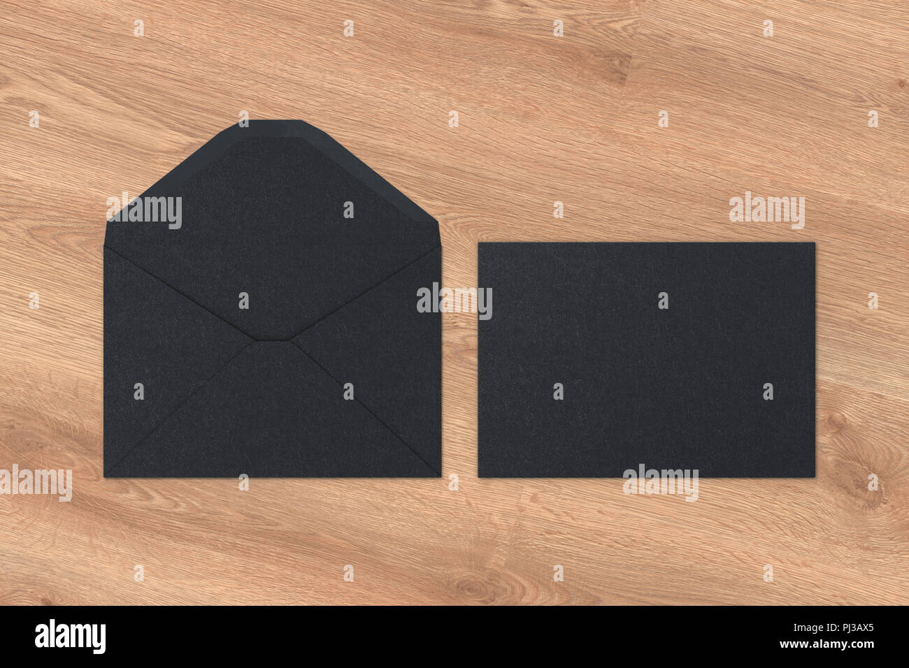 Black blank closed envelope and open envelope on wooden background. 3d ...