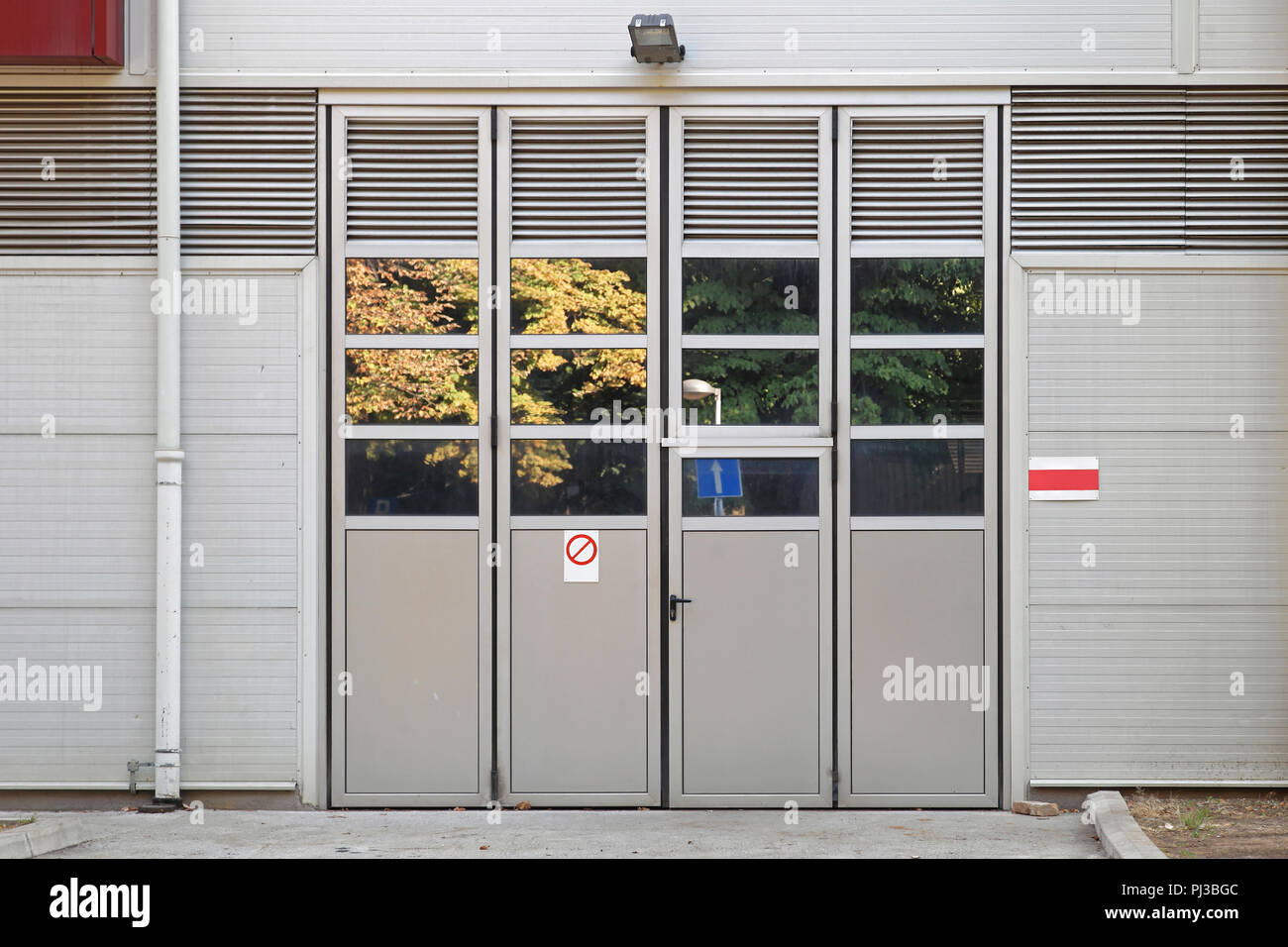 Big Industrial Doors at Factory Building Exterior Stock Photo - Alamy