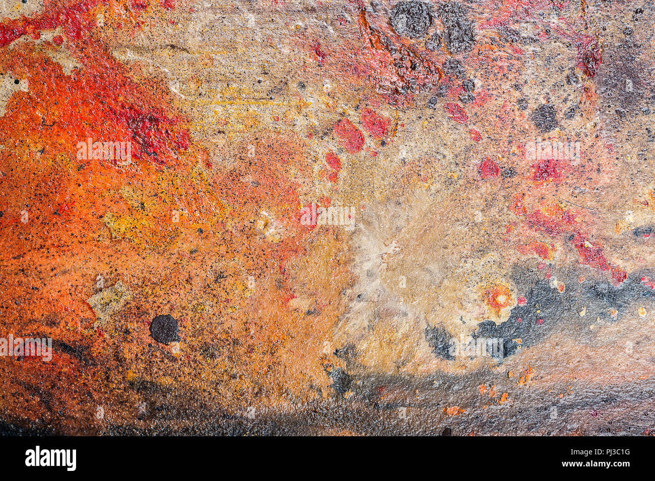 Yellow brown and red messy wall stucco texture background. Decorative ...