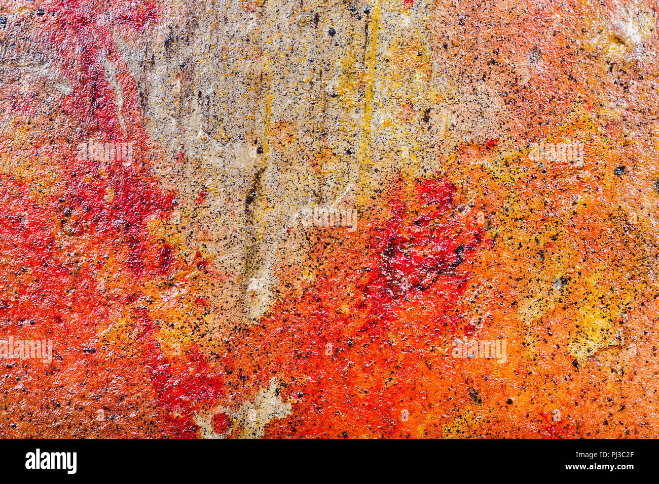 Yellow brown and red messy wall stucco texture background. Decorative ...