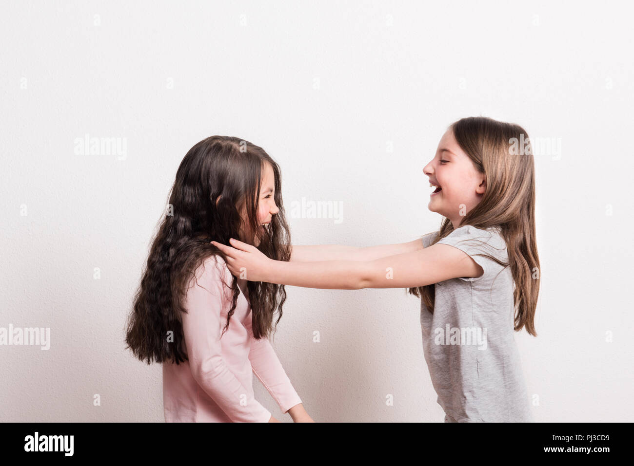 Two people standing opposite each other hi-res stock photography and ...
