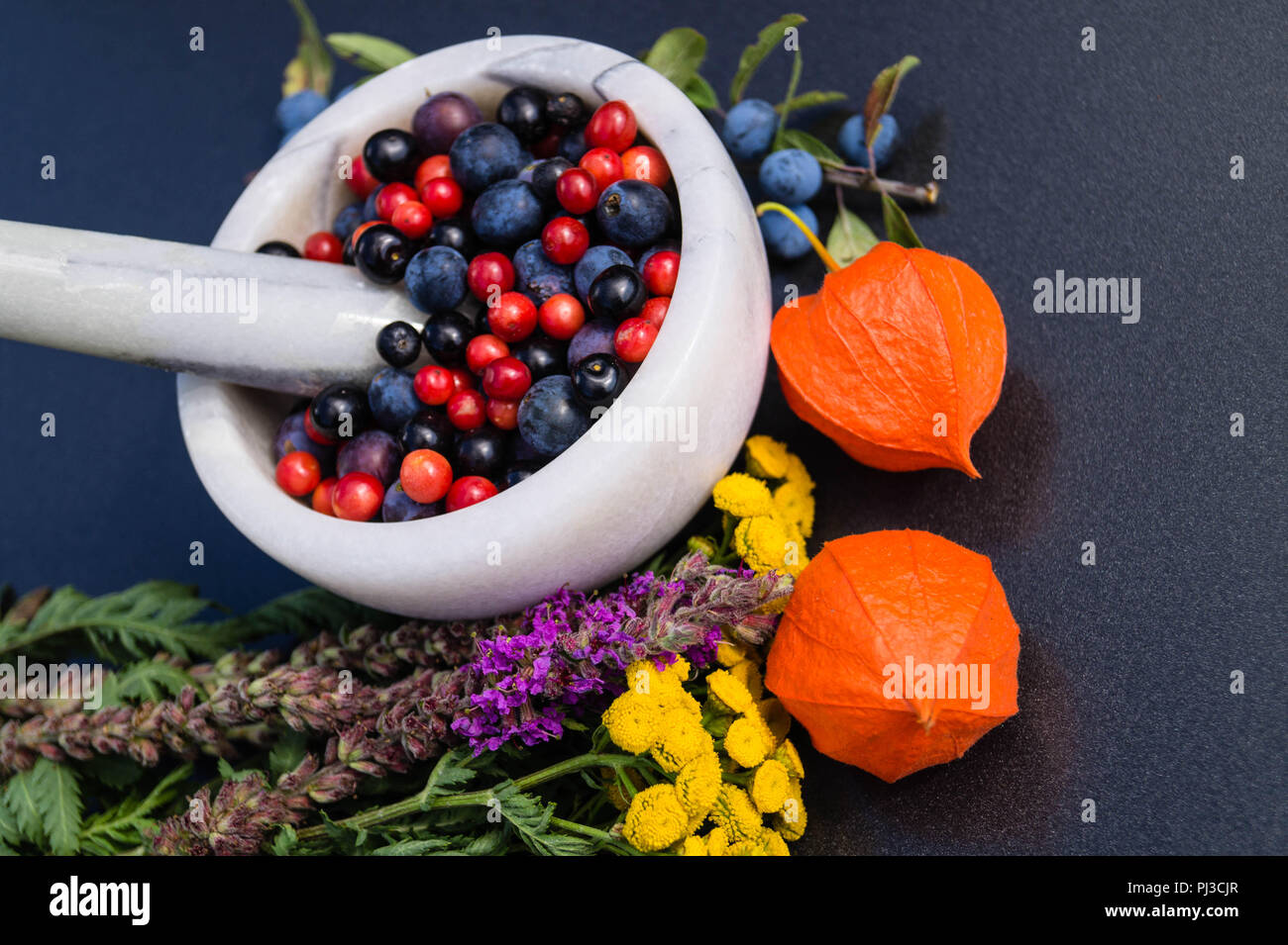 different berries colourful and healthy Stock Photo - Alamy