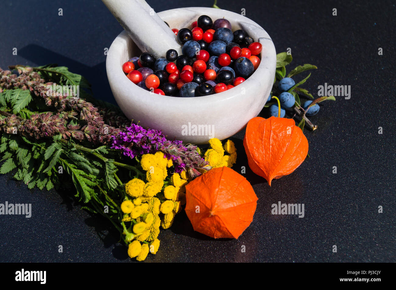different berries colourful and healthy Stock Photo - Alamy