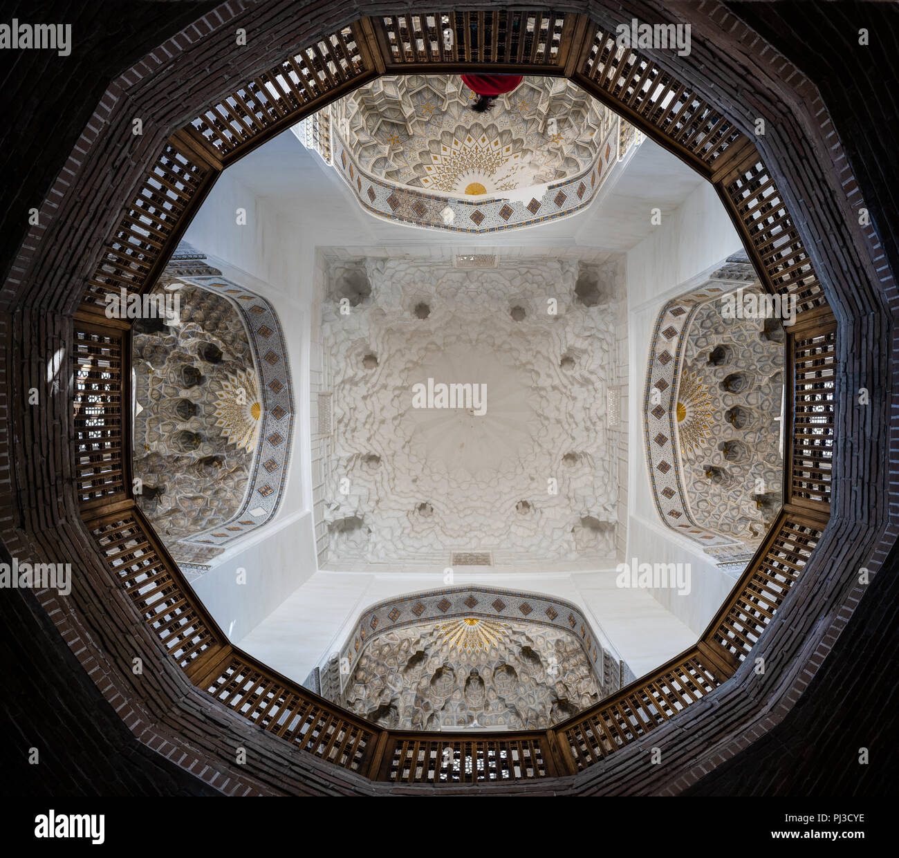 Interior of Bibi Khanum mausoleum in Samarcanda, decorated with plaster ...