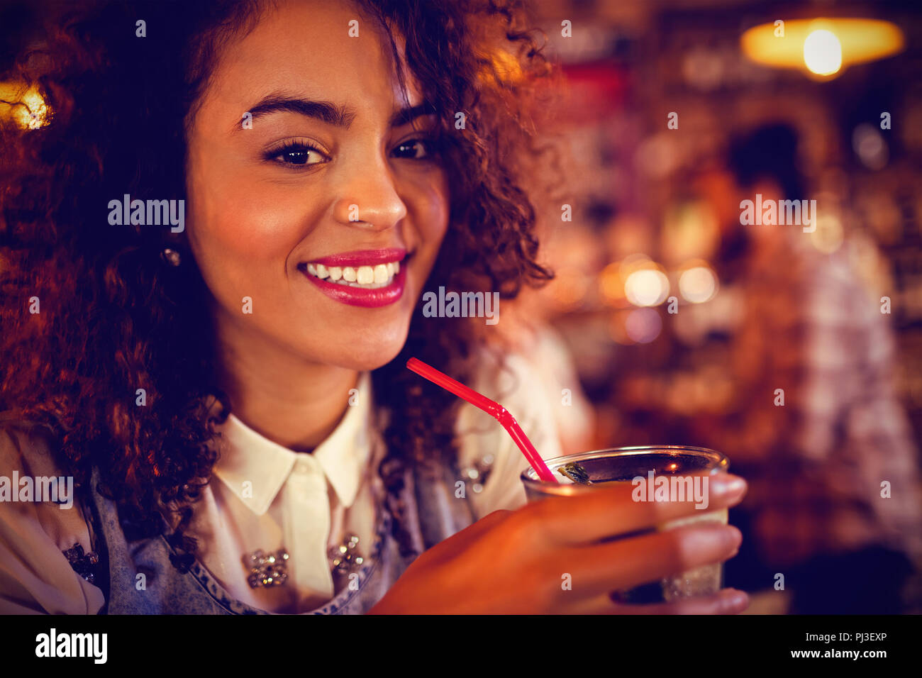 Young woman drink straw hi-res stock photography and images - Alamy