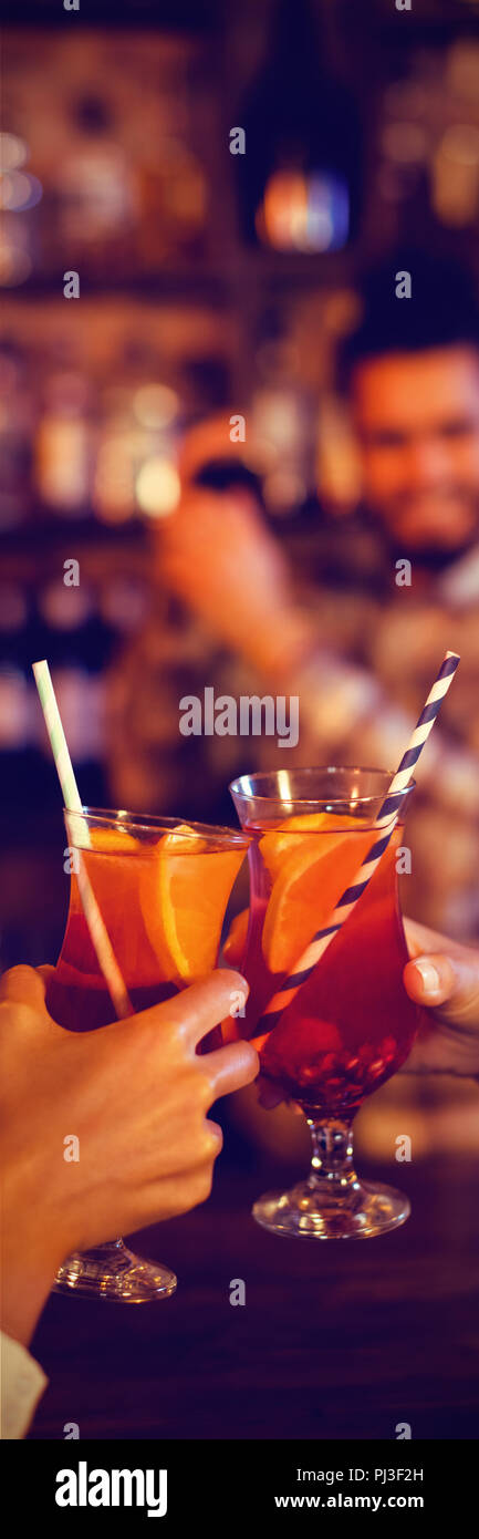 Hands holding cocktail hi-res stock photography and images - Alamy