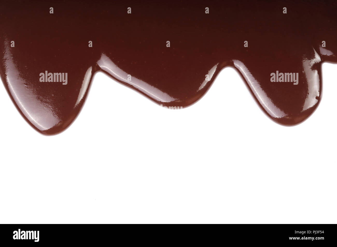 Melted chocolate dripping isolated on white background Stock Photo - Alamy
