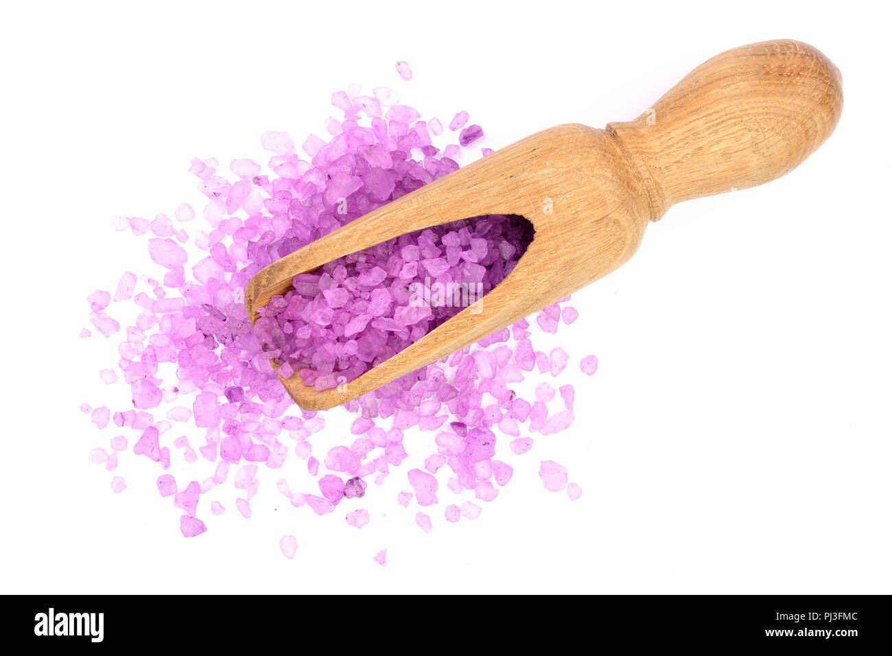 Violet sea salt in wooden scoop isolated on white background, lavender ...