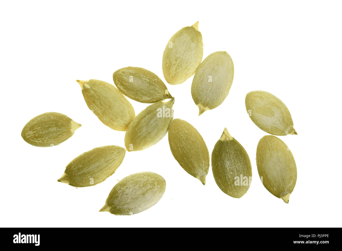 Pumpkin seeds or pepitas, isolated on white background. Top view. Flat ...