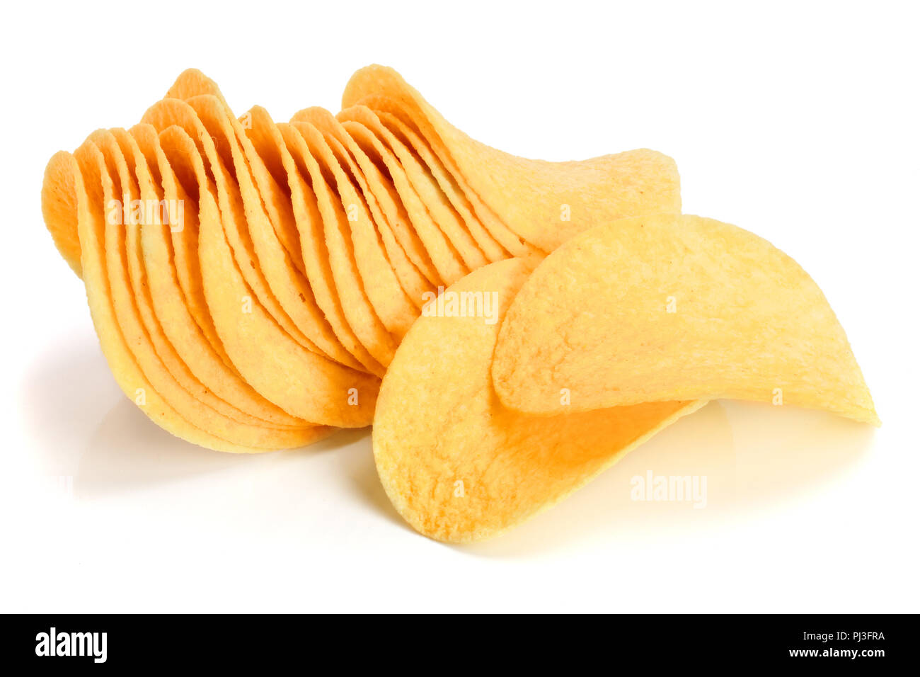 heap of potato chips on white background close-up Stock Photo - Alamy