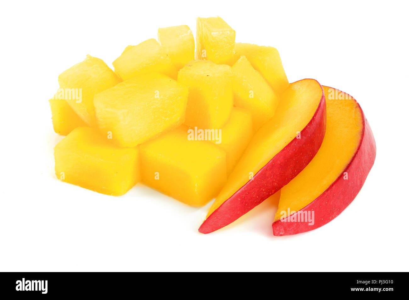cube and slices of Mango fruit isolated on white background close-up ...