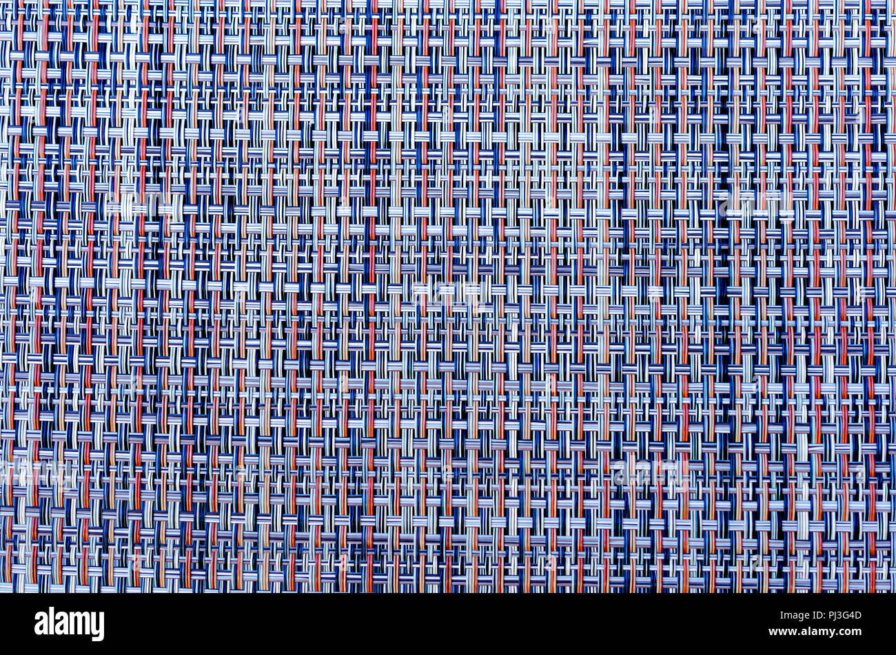 Multi colored cross weave, plastic fabric. Closeup showing weaves Stock ...