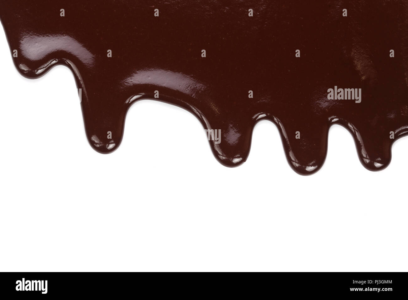 Melted chocolate dripping isolated on white background Stock Photo - Alamy