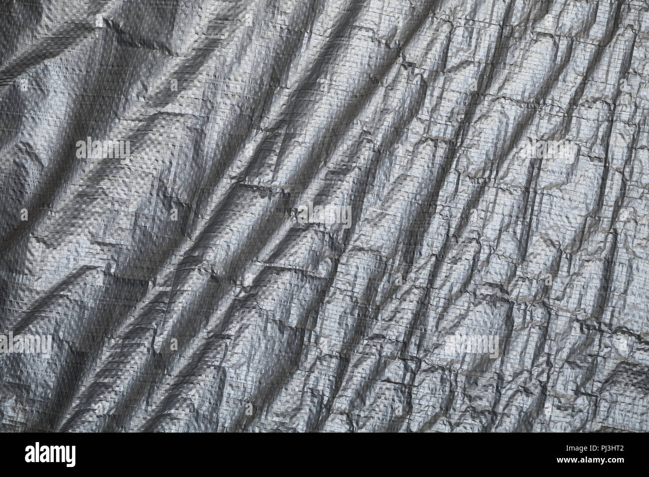 Creased plastic polyethylene film, background texture Stock Photo - Alamy