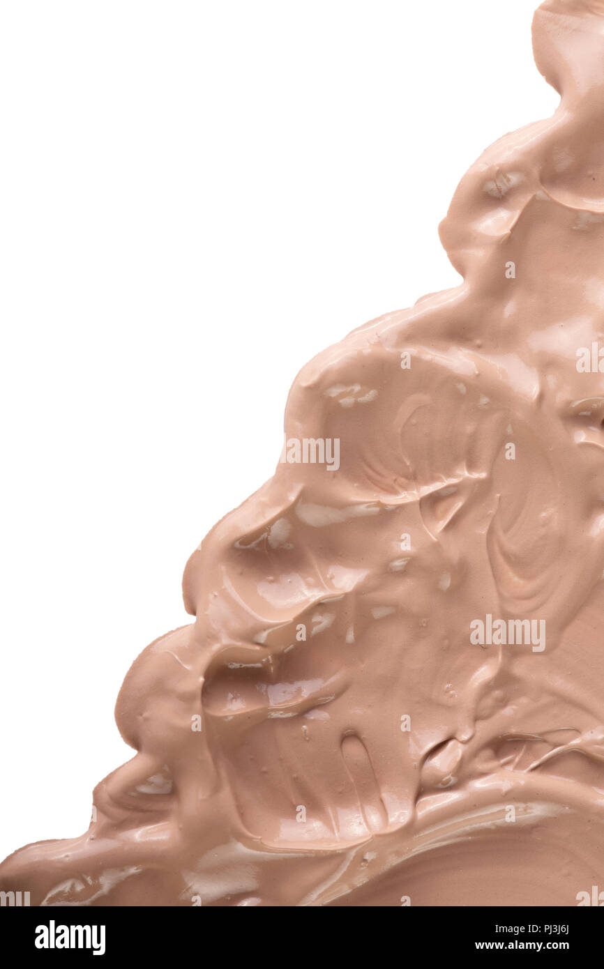 Beige liquid foundation makeup isolated on white background with copy ...