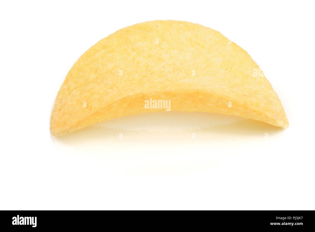 Single potato chip on white background close-up Stock Photo - Alamy