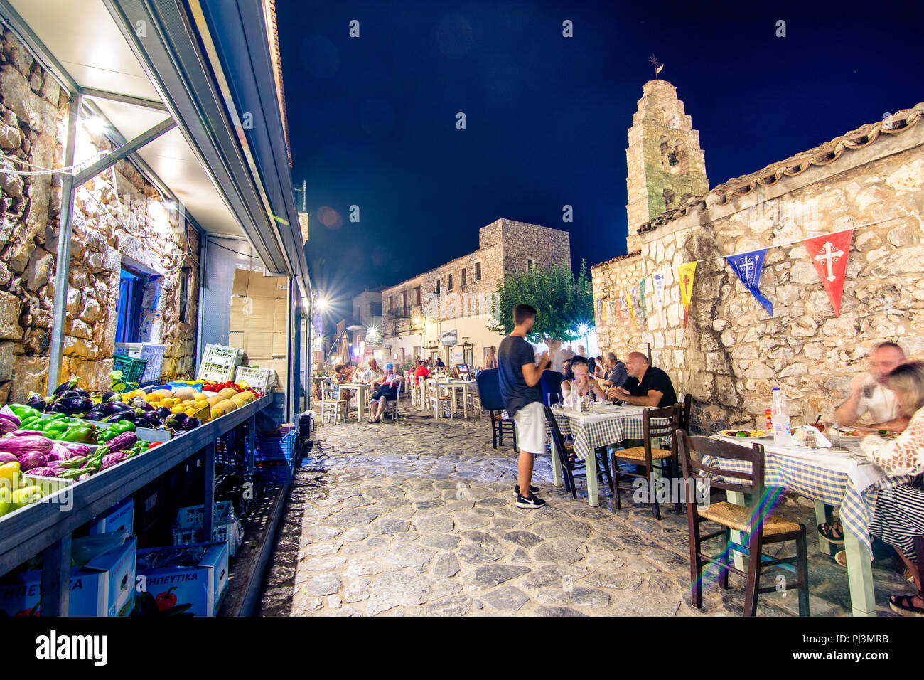 Night view of the traditional village of Areopoli in Mani region with ...