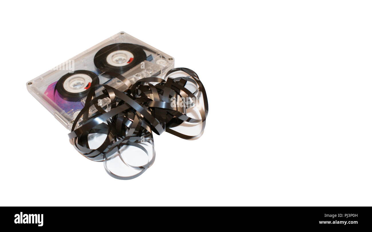 Tangled broken cassette with white background Stock Photo - Alamy