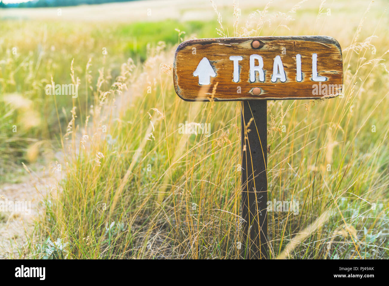 trail sign on the grass field Stock Photo - Alamy