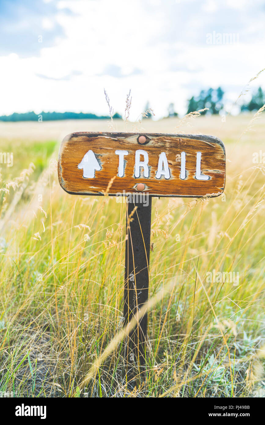 trail sign on the grass field Stock Photo - Alamy