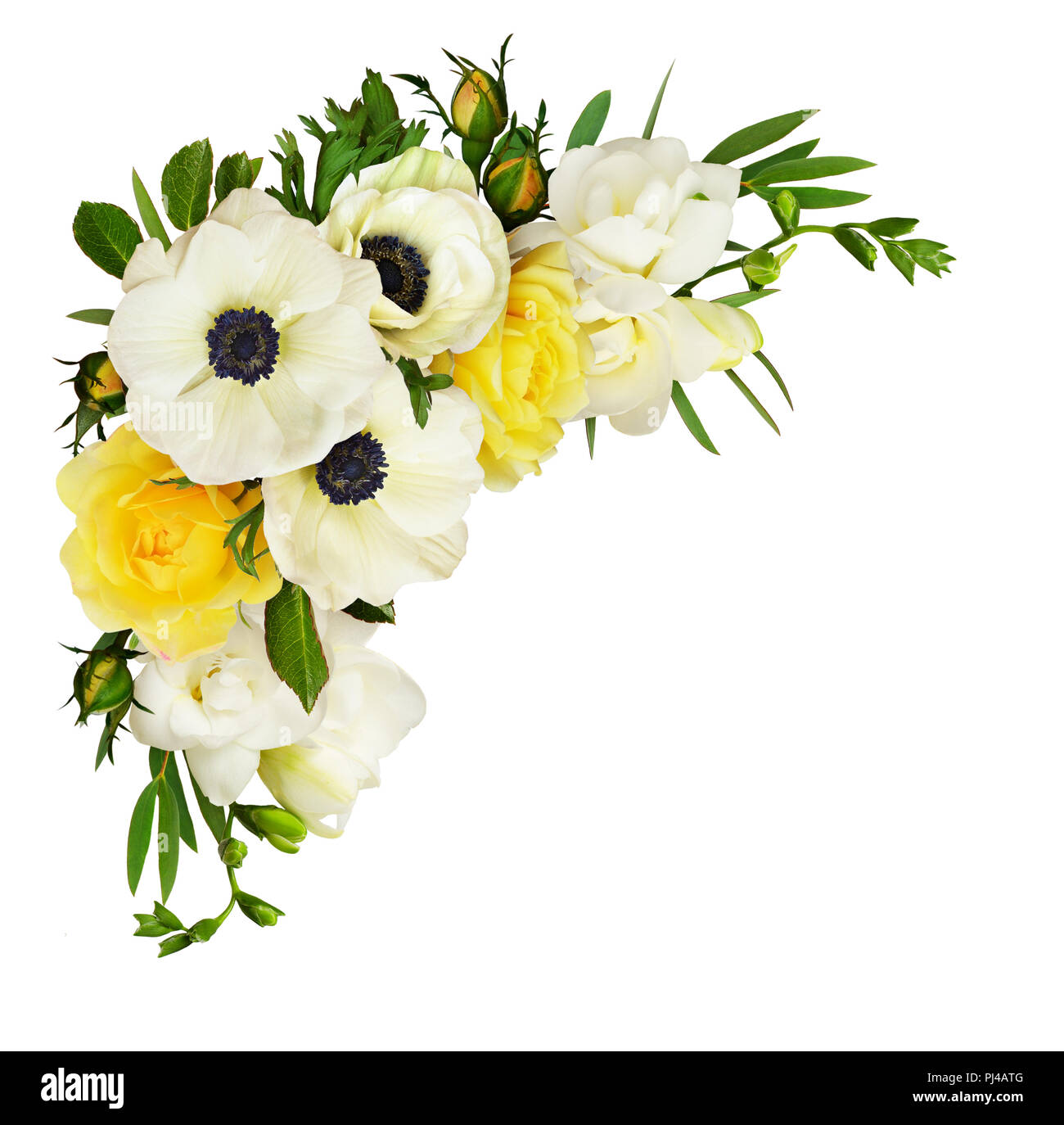 White anemones, yelow roses, eucalyptus leaves and freesia flowers in a ...