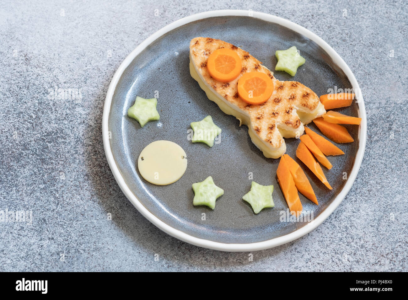 Funny grilled cheese sandwich look like rocket in a space Stock Photo ...