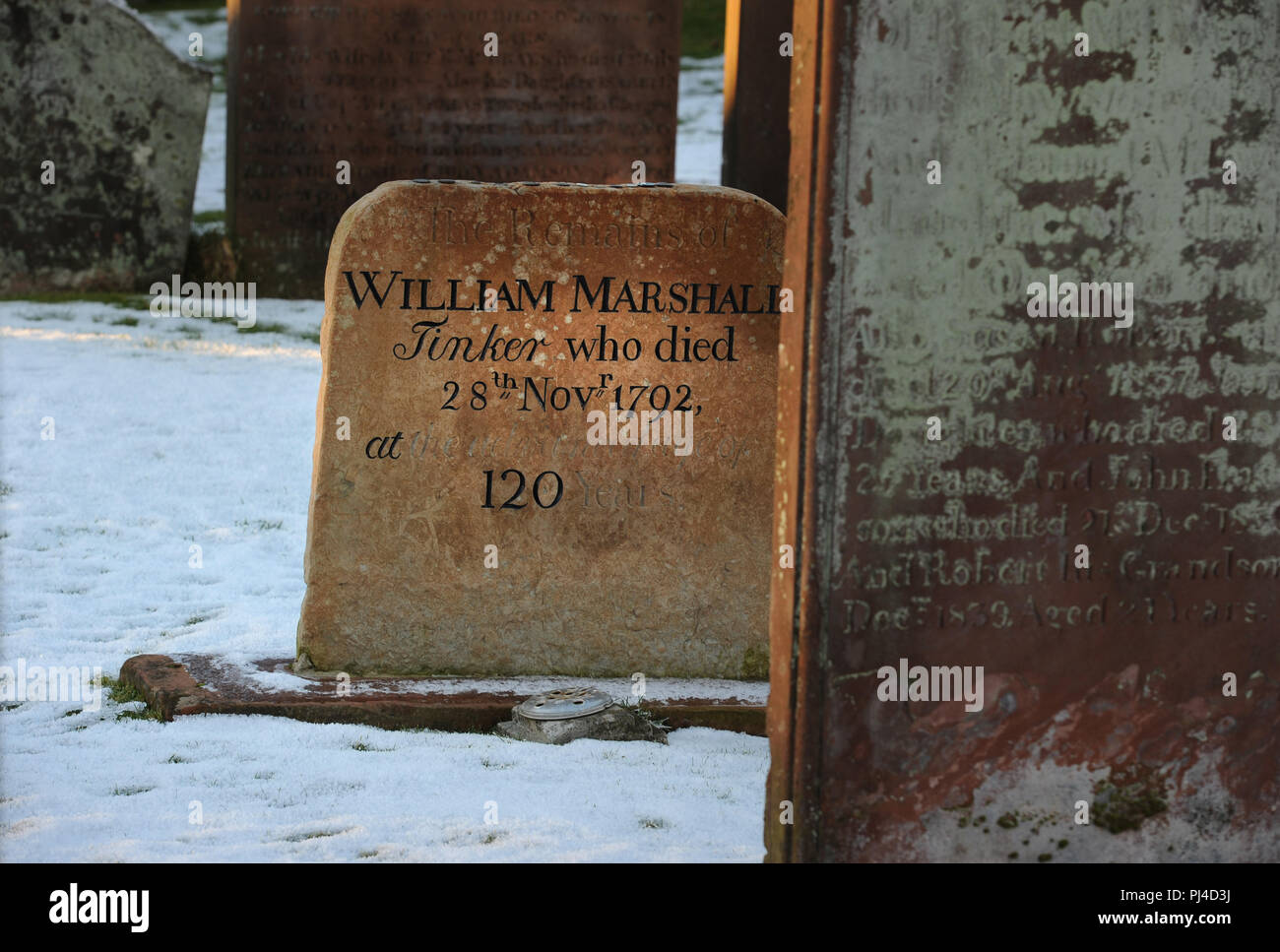 Winter snow the grave of tinker William Marshall, said to be 120 years ...