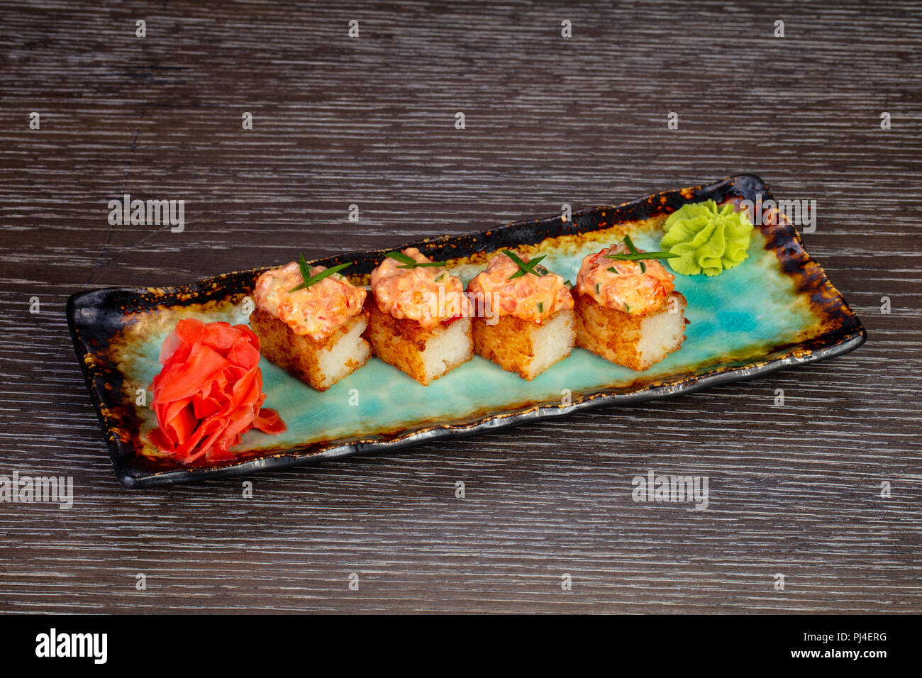 Crispy rice roll with tuna and wasabi Stock Photo - Alamy