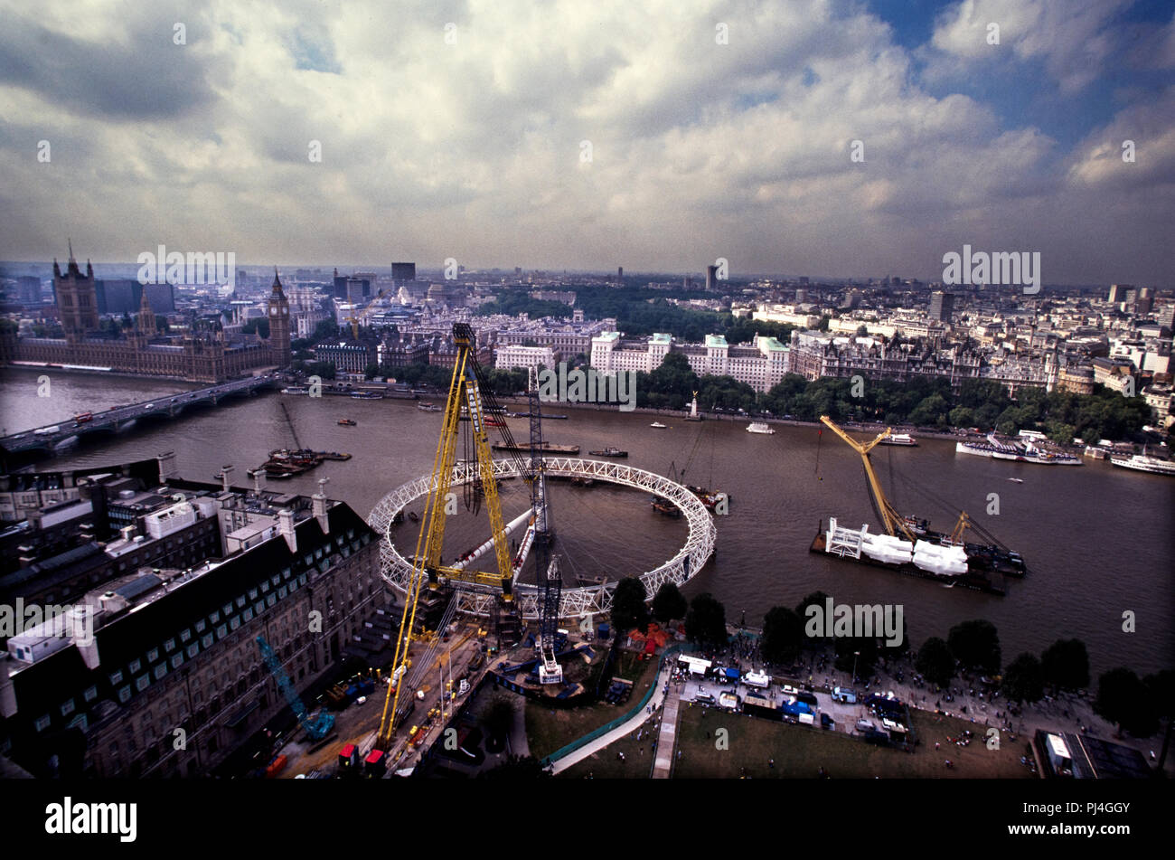 London Eye being erected at site on south bank of the River Thames in ...
