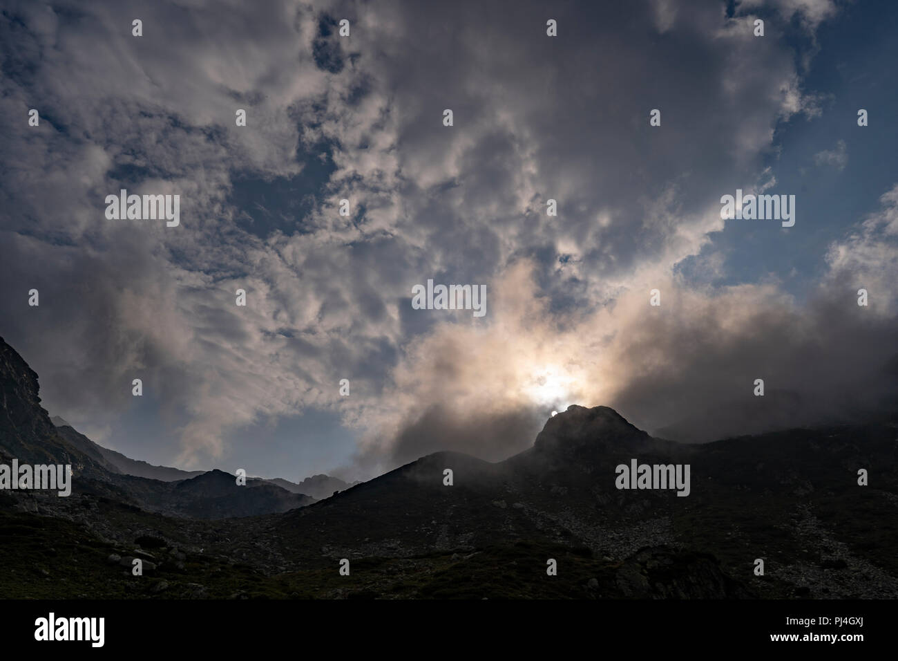 Hikers enthusiasts reach Parangul Mare, 2519m altitude, during a 3 days ...