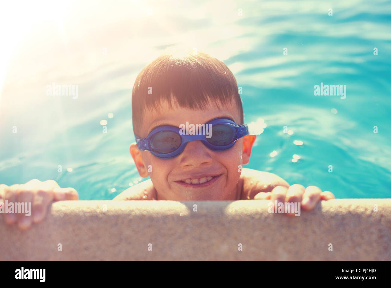Holding edge of swimming pool hi-res stock photography and images - Alamy