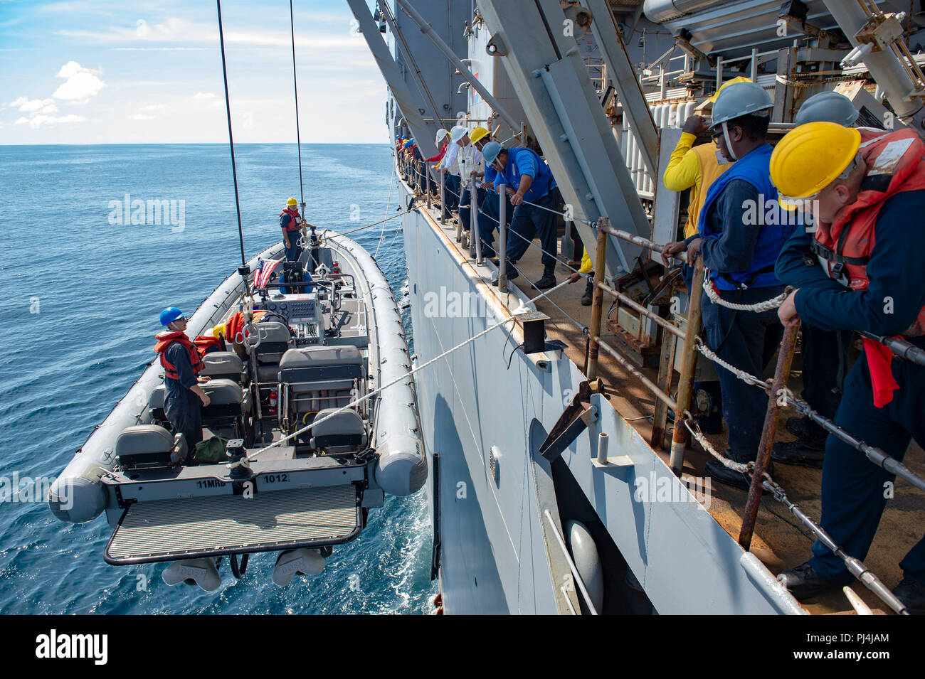180827-N-AT530-0504 ATLANTIC OCEAN (Aug. 27, 2018) – Sailors observe as ...