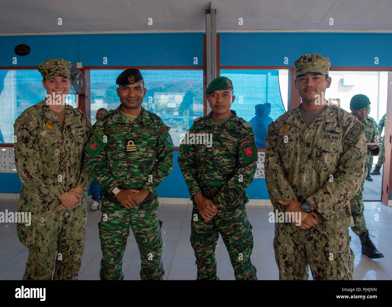 Master-at-Arms 2nd Class Cari Guida, left, from Buffalo, New York, and ...