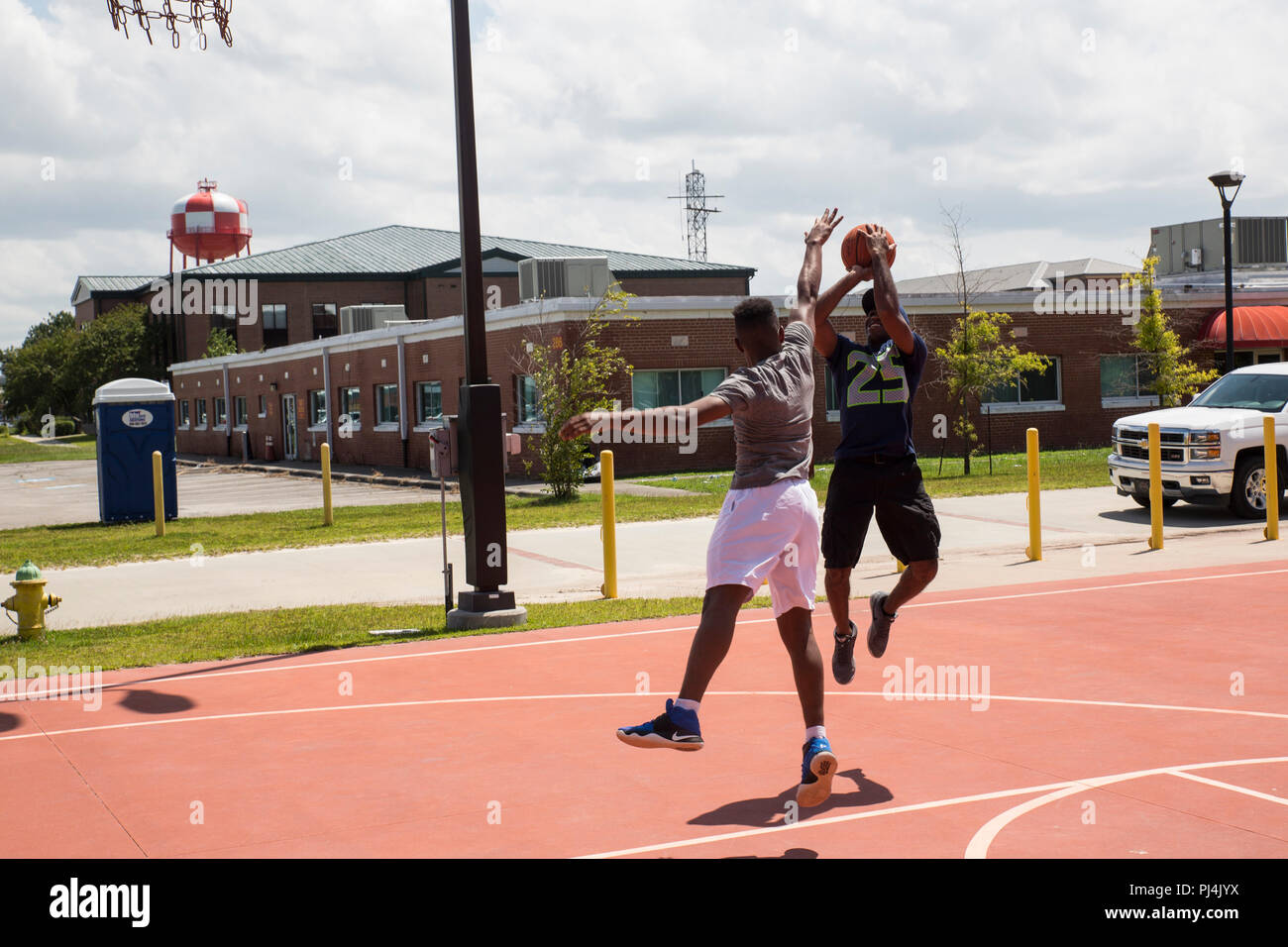 Marines play basketball during the second annual Headquarters and ...