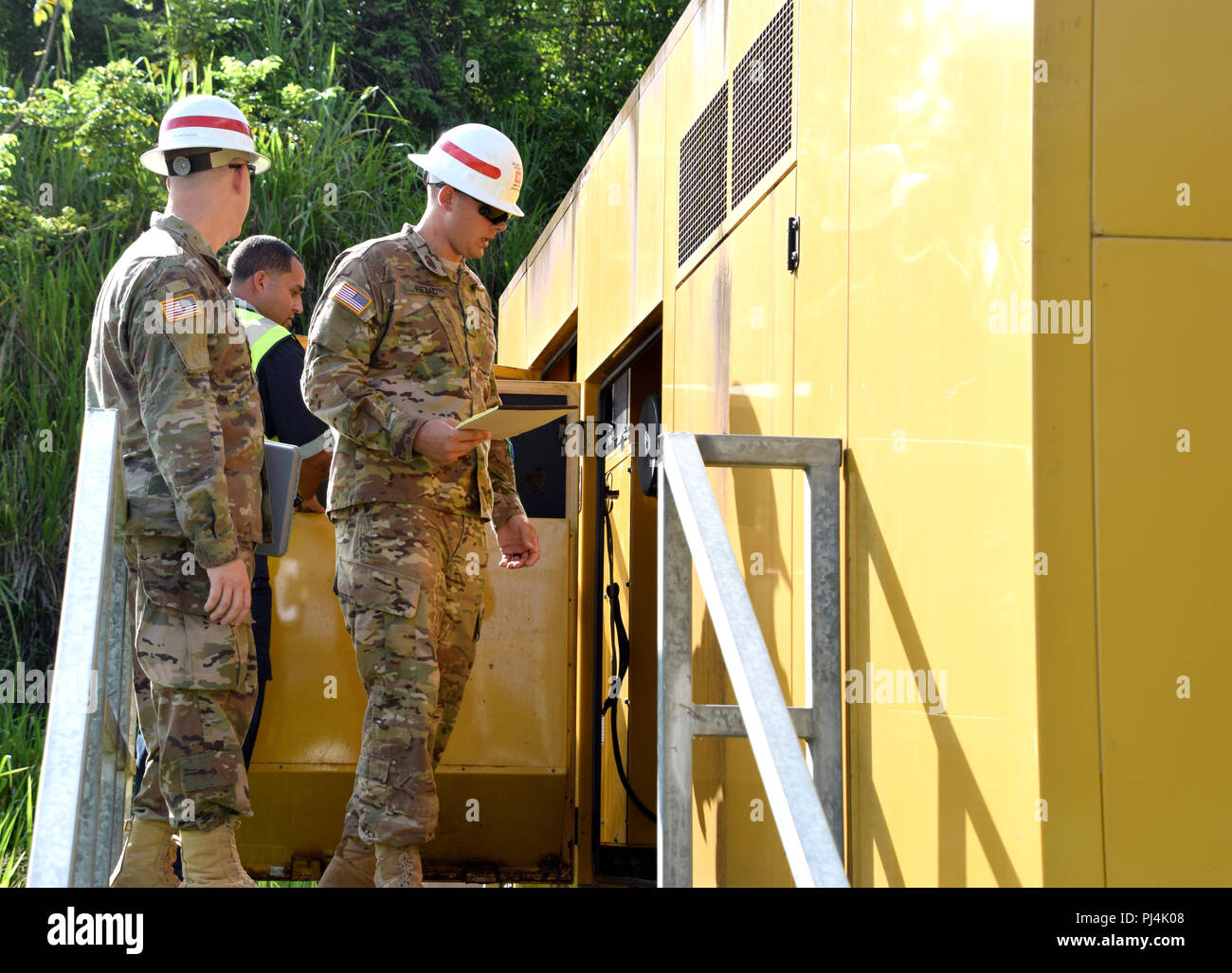 Members of the 249th Engineer Battalion (Prime Power), along with ...