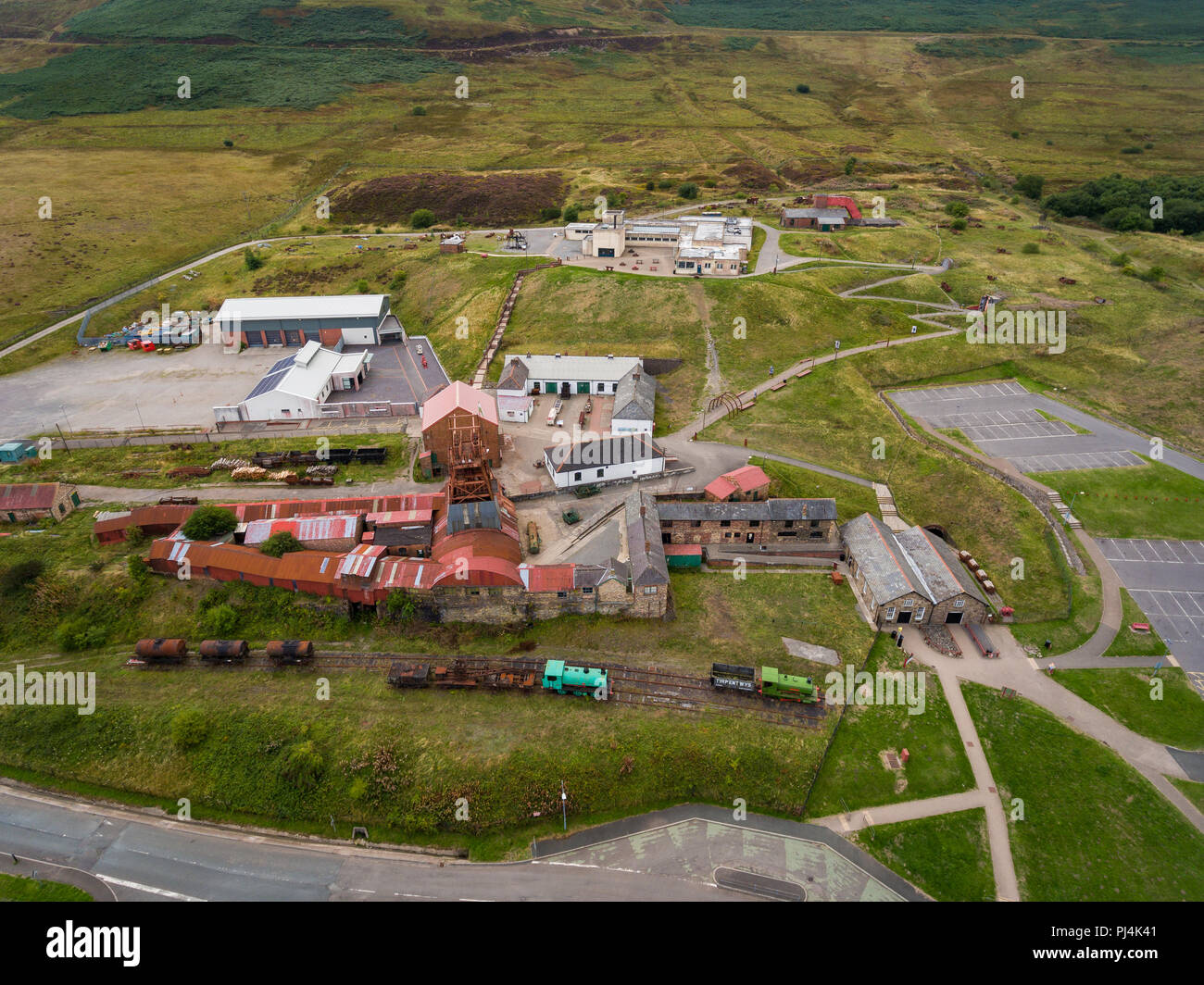 An aerial view of an Old Coal Mine Pit Yard on overcast Day, Blaenavon ...
