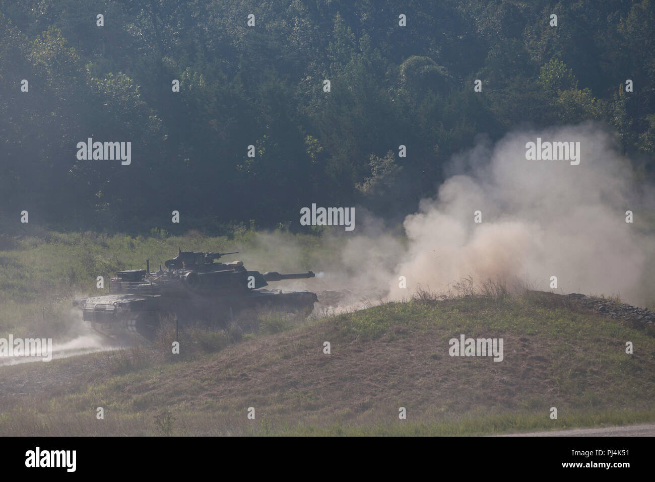 A crew of Marines from 4th Tank Battalion drive onto Wilcox range to ...