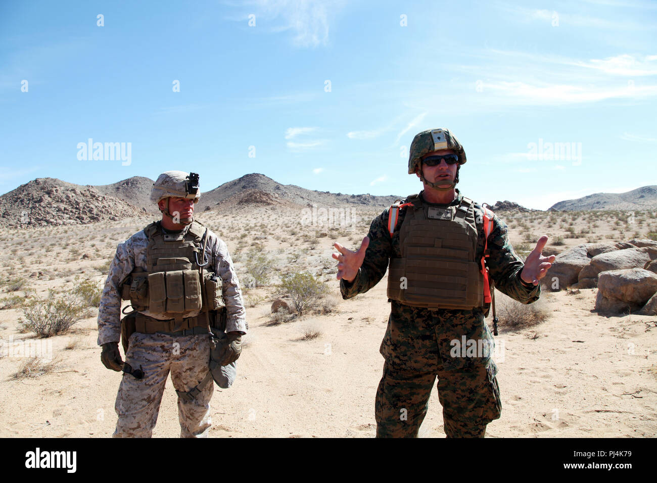 BGen Roger B. Turner, Combat Center Commanding General, right, talks ...