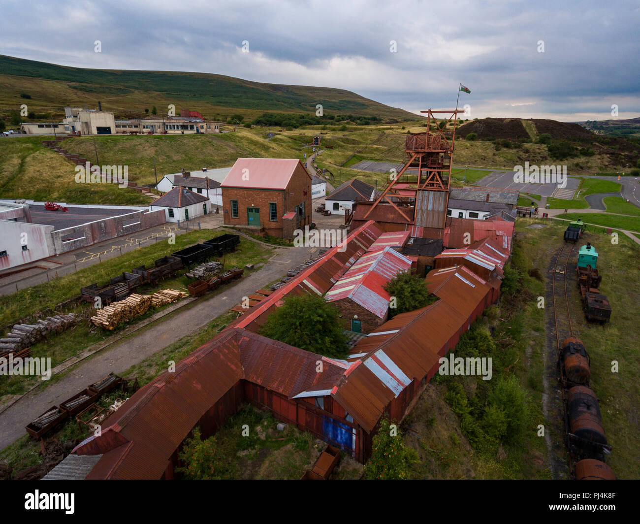 An aerial view of an Old Coal Mine Pit Yard on overcast Day, Blaenavon ...