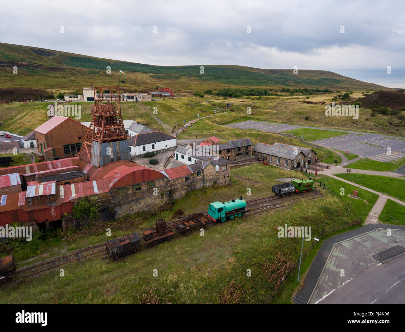 An aerial view of an Old Coal Mine Pit Yard on overcast Day, Blaenavon ...