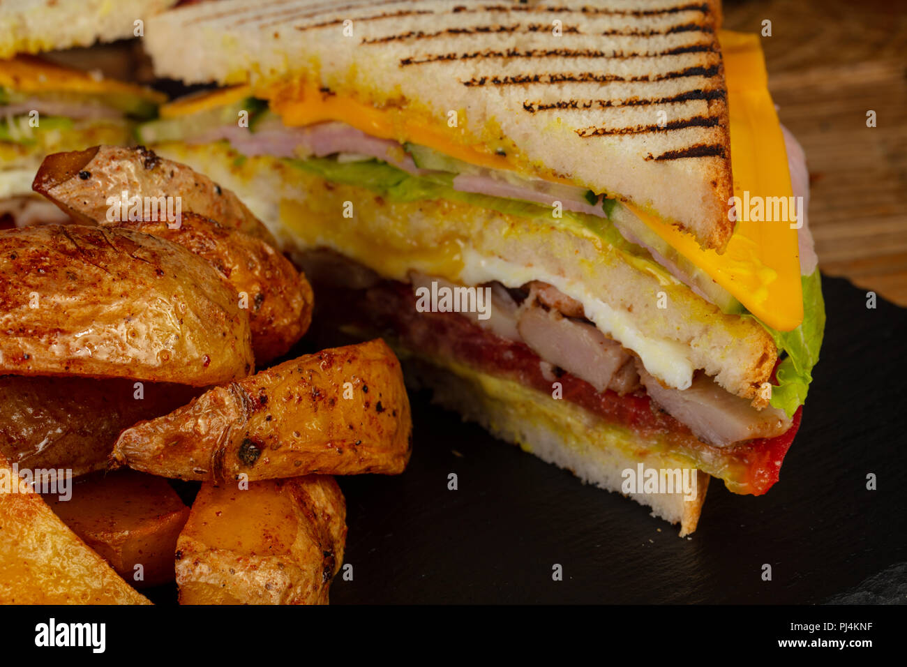Delicious chef sandwich with fried french fries Stock Photo - Alamy
