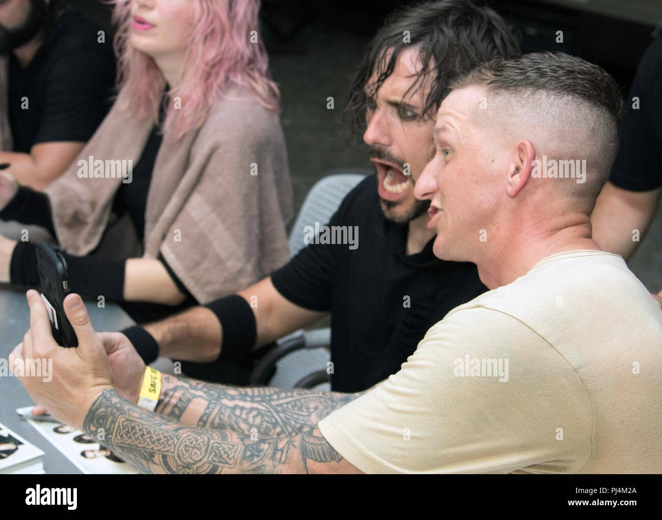 A Joint Task Force Guantanamo Trooper poses for a selfie with Sick ...