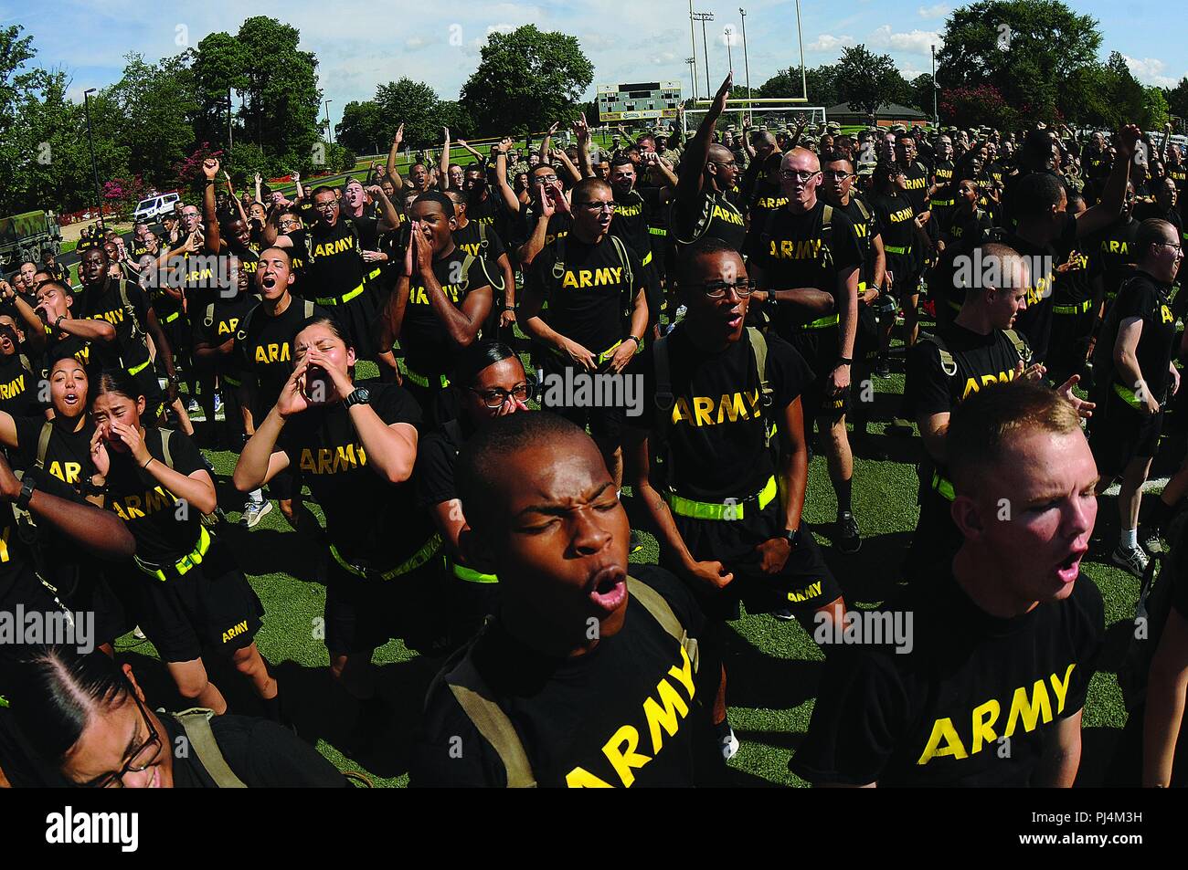 Soldiers cheer on their units during the 23rd Quartermaster Brigade ...