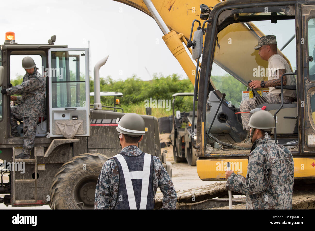 U.S. Air Force Airmen and members of the Japan Air Self-Defense Force ...