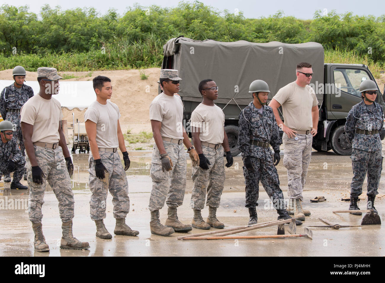 U.S. Air Force Airmen and members of the Japan Air Self-Defense Force ...