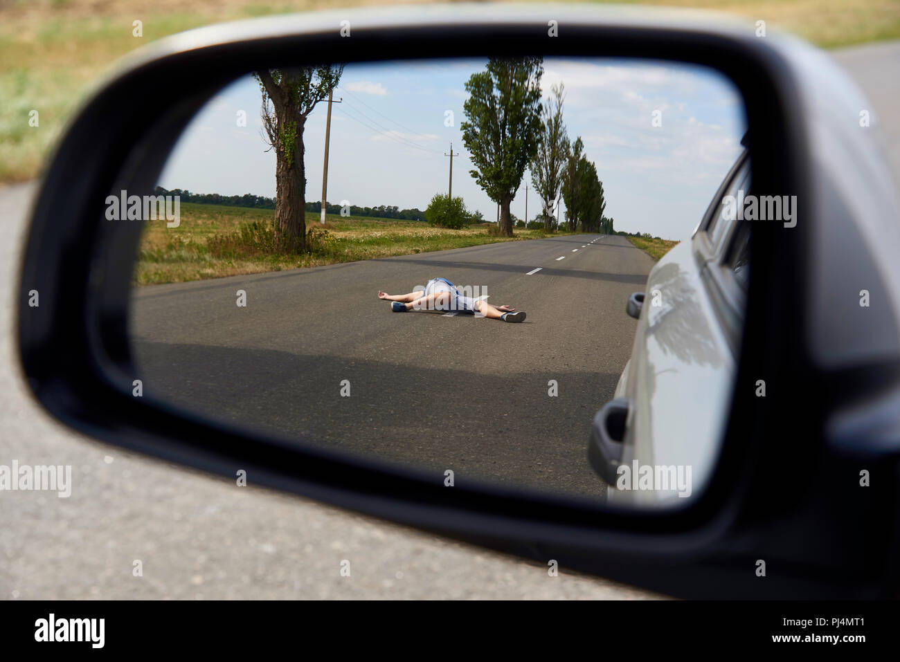 Young man hit by car hi-res stock photography and images - Alamy
